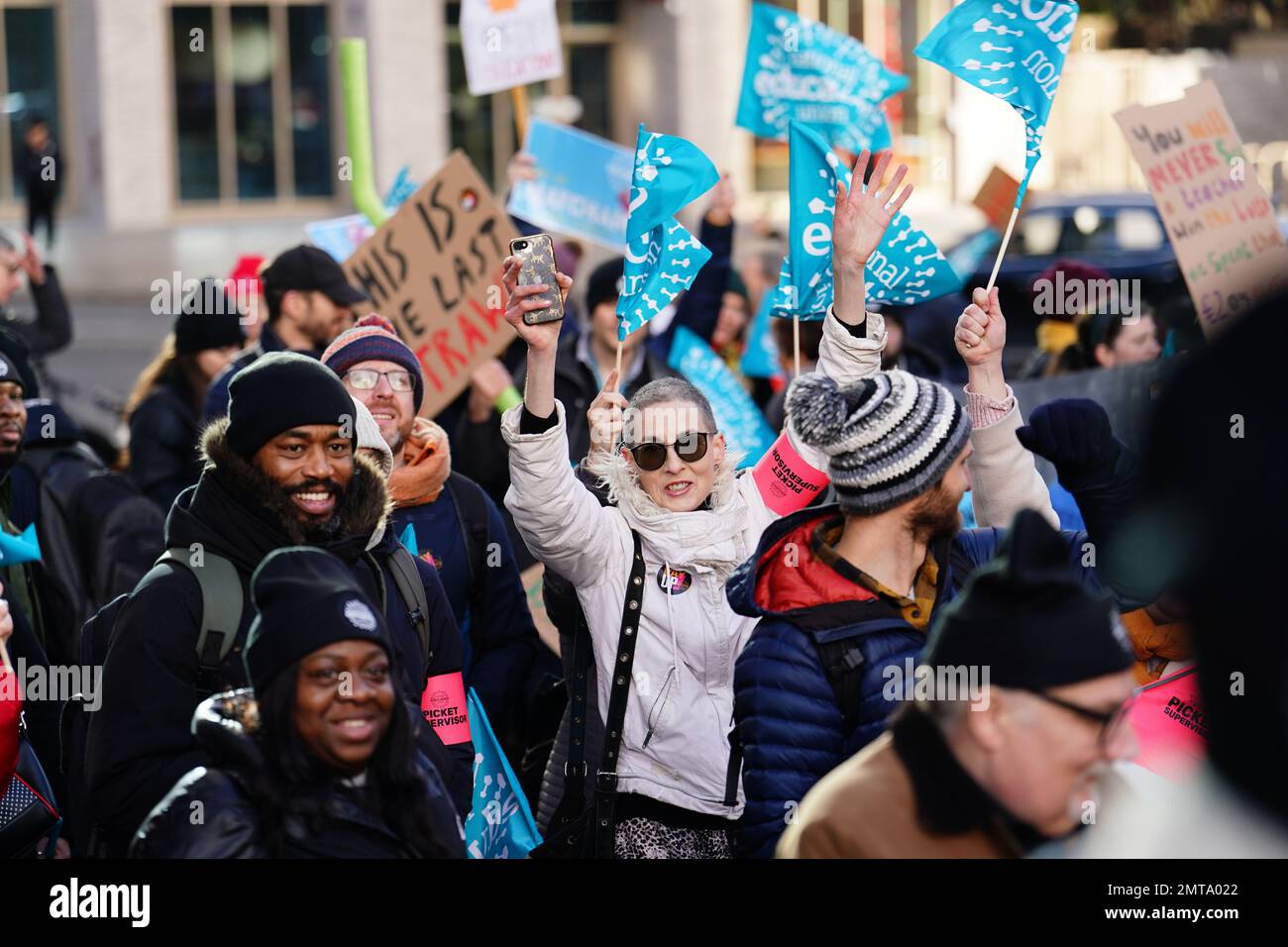 Members of the National Education Union (NEU) join fellow strikers from ...