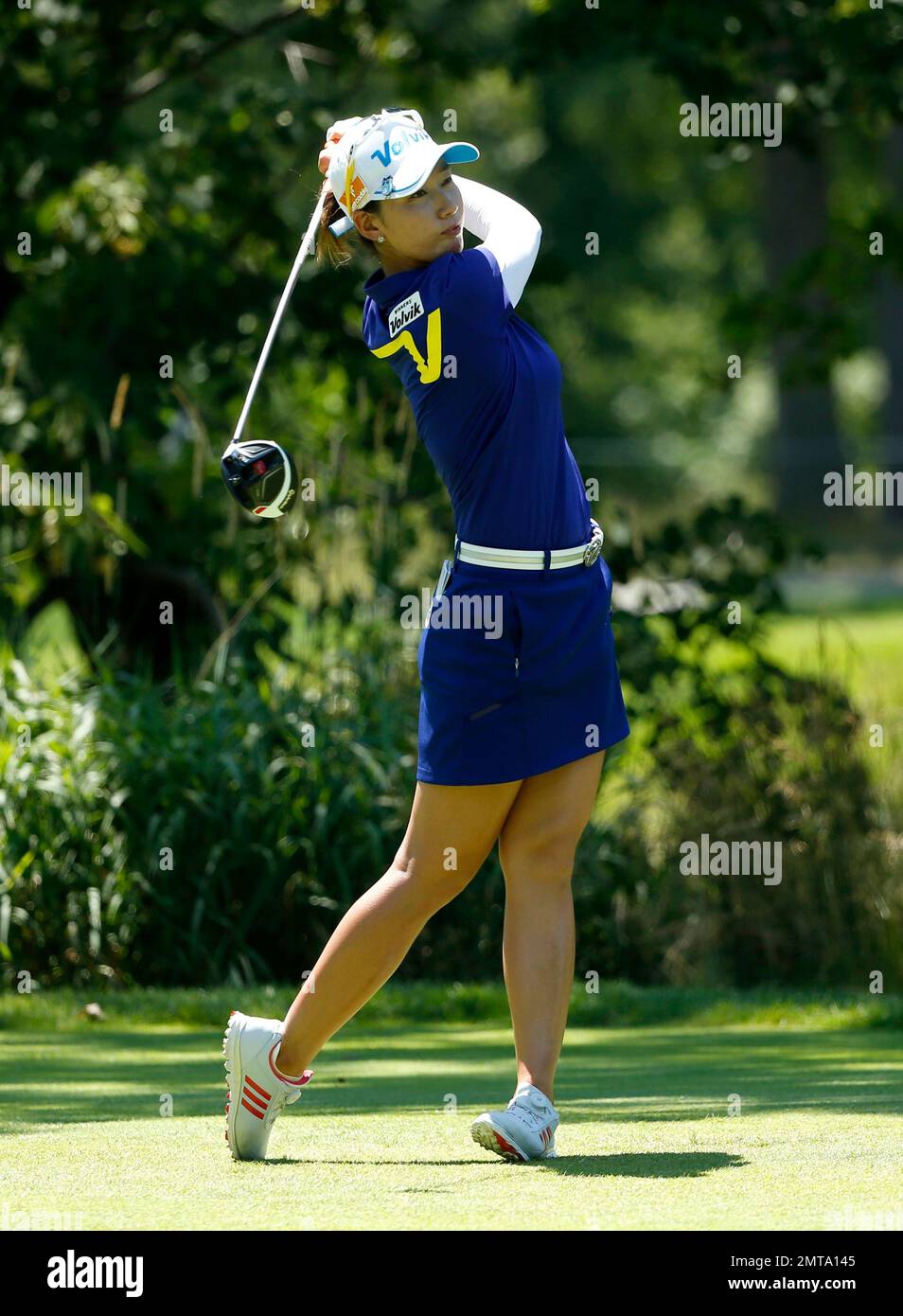 Chella Choi, of South Korea, watches her tee shot on the fifth hole ...