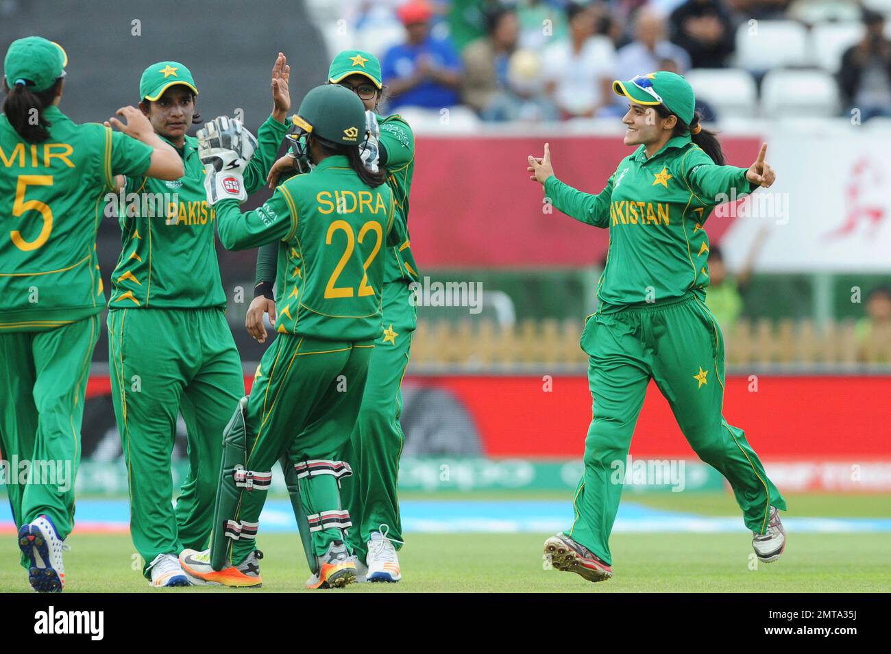 Pakistani cricketers celebrate the dismissal of India's Mona Meshram ...