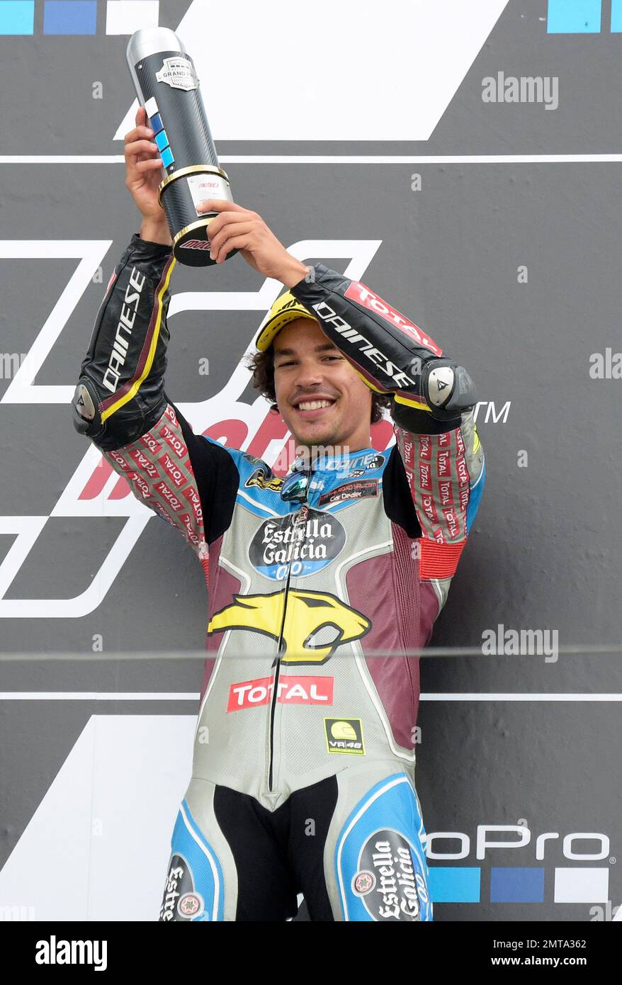 Moto 2 rider Franco Morbidelli of Italy lifts his trophy on the podium ...