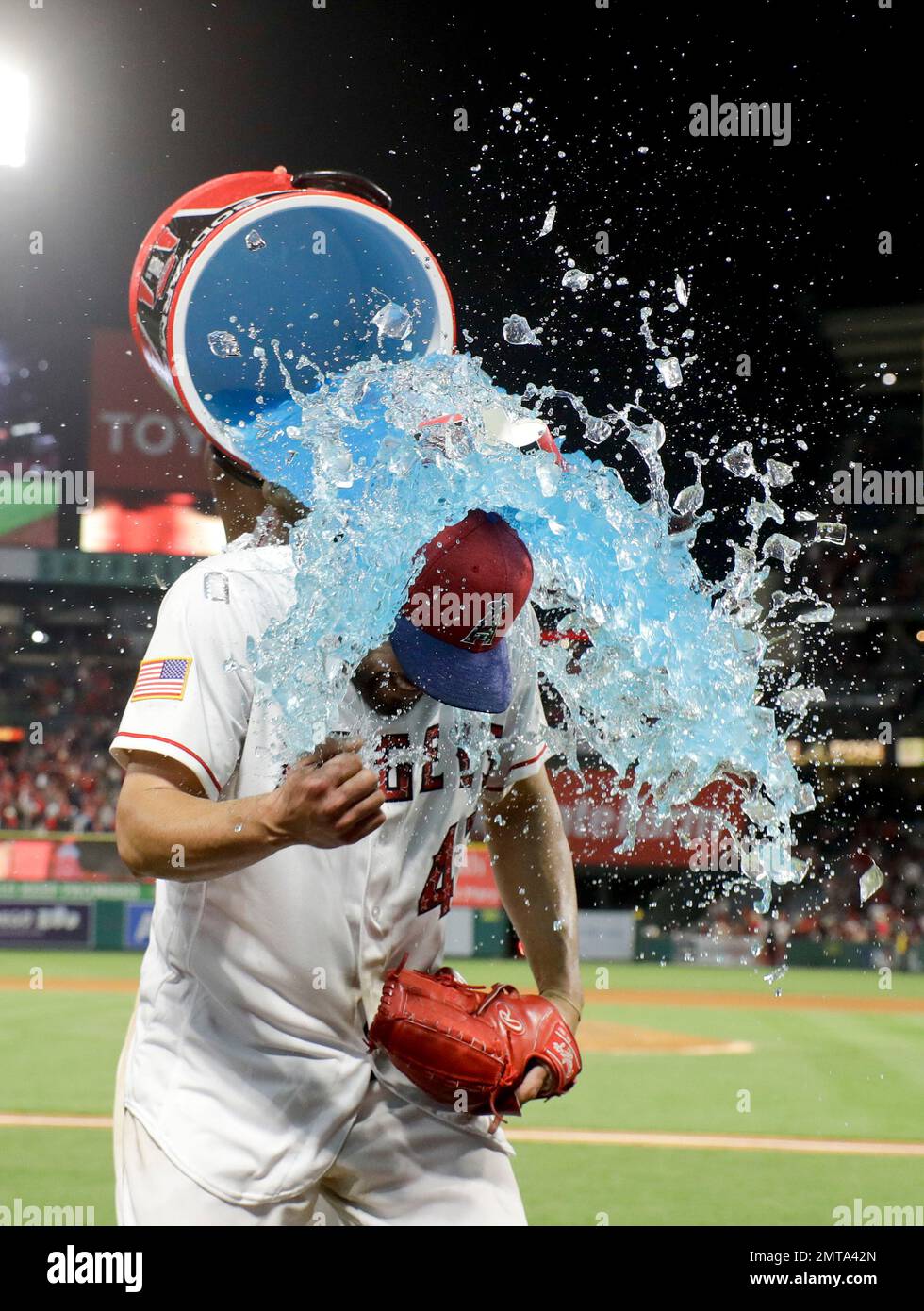 Los Angeles Angels pitcher Ricky Nolasco gets doused after throwing a ...