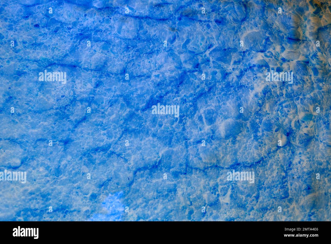 Abstract photo of glow in neon blue color of transparent water texture ...