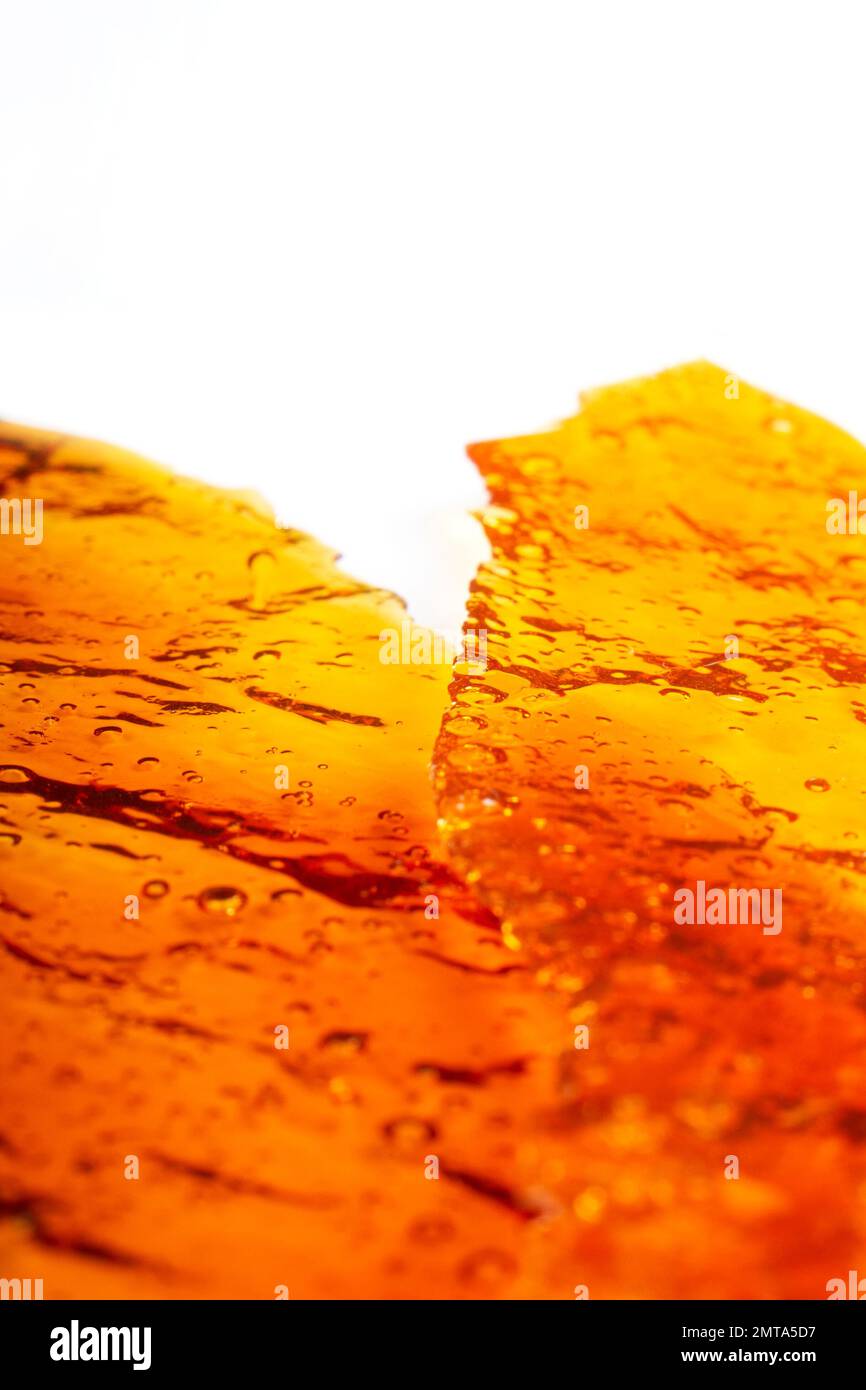 golden extract crystalline cannabis wax. concentrate high thc Stock ...