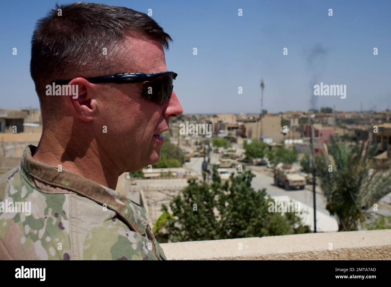 Colonel Pat Work of the U.S. Army's 82nd airborne division looks at the ...