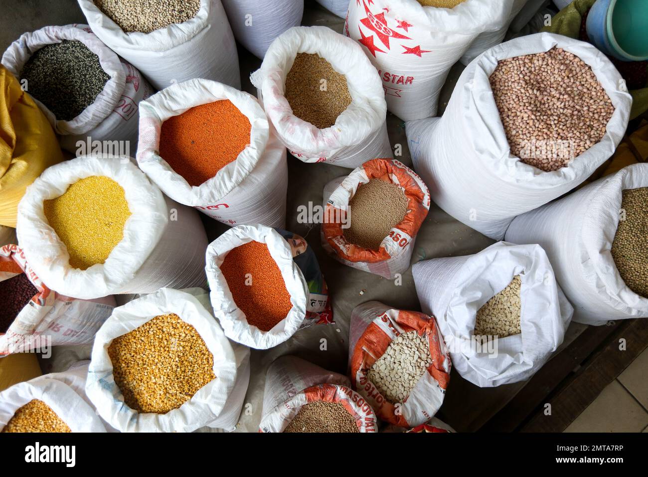 Yangon, Myanmar. 1st Feb, 2023. A shop displays beans and pulses in gunny bags at a wholesale ...