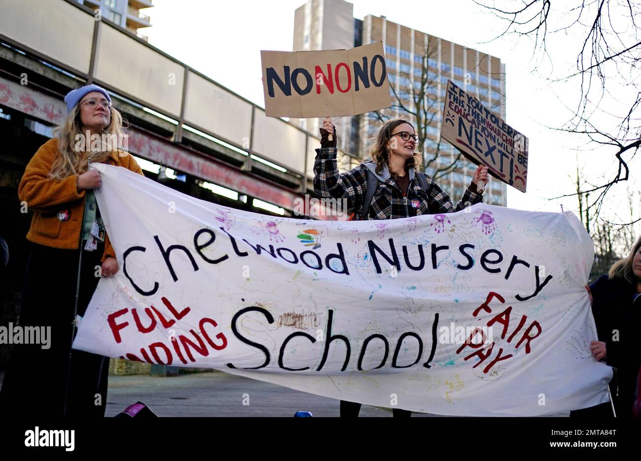 Members of the National Education Union (NEU) join fellow strikers from ...