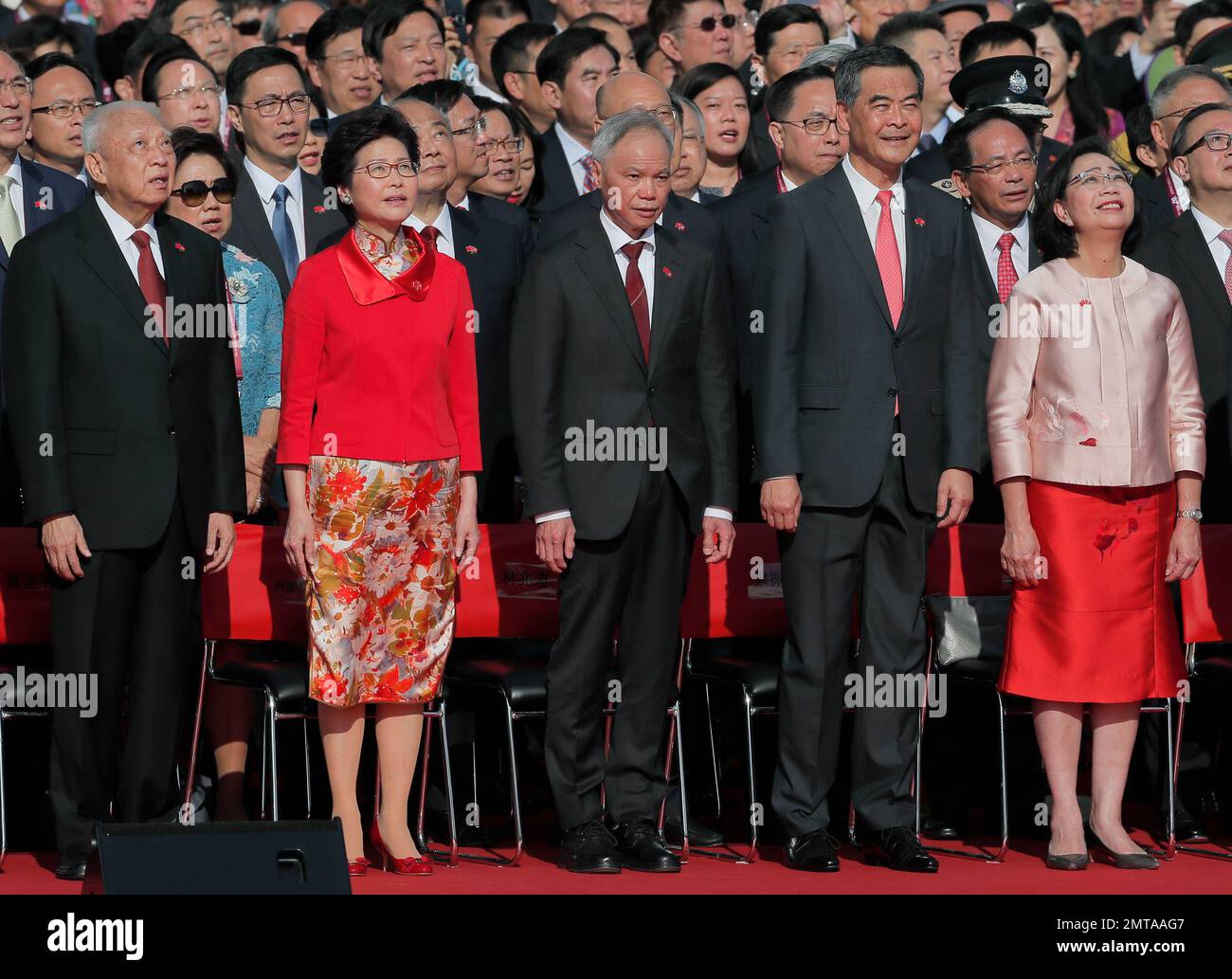From left in front, former Hong Kong Chief Executive Tung Chee-hwa ...