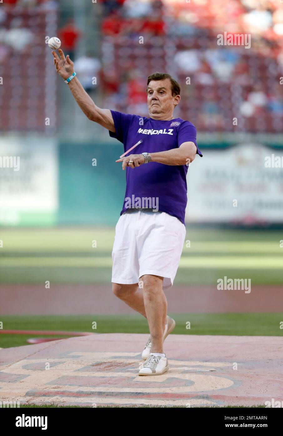 Former Missouri head football coach Warren Powers throws out a first ...