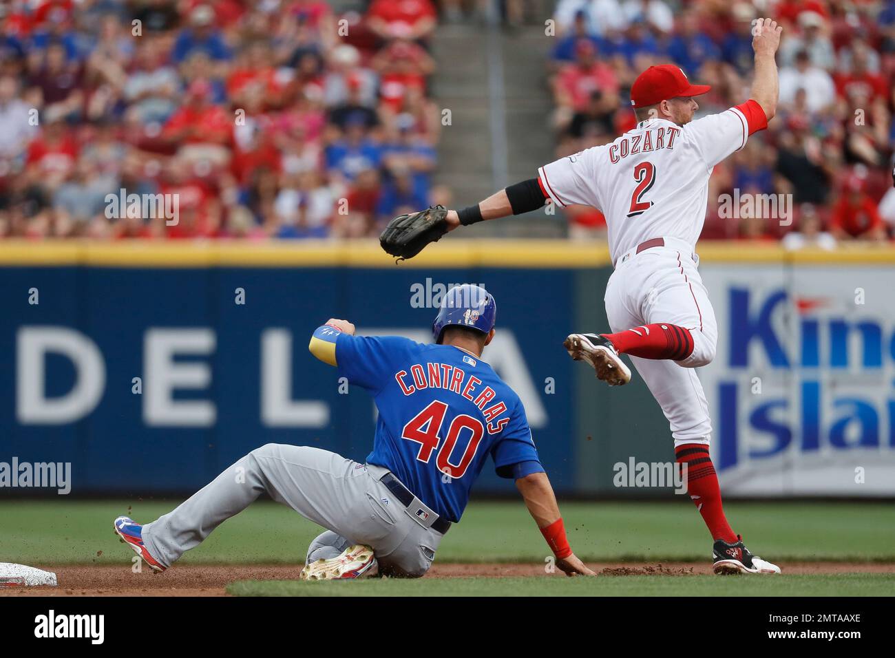 Cincinnati Reds shortstop Zack Cozart (2) forces out Chicago Cubs ...