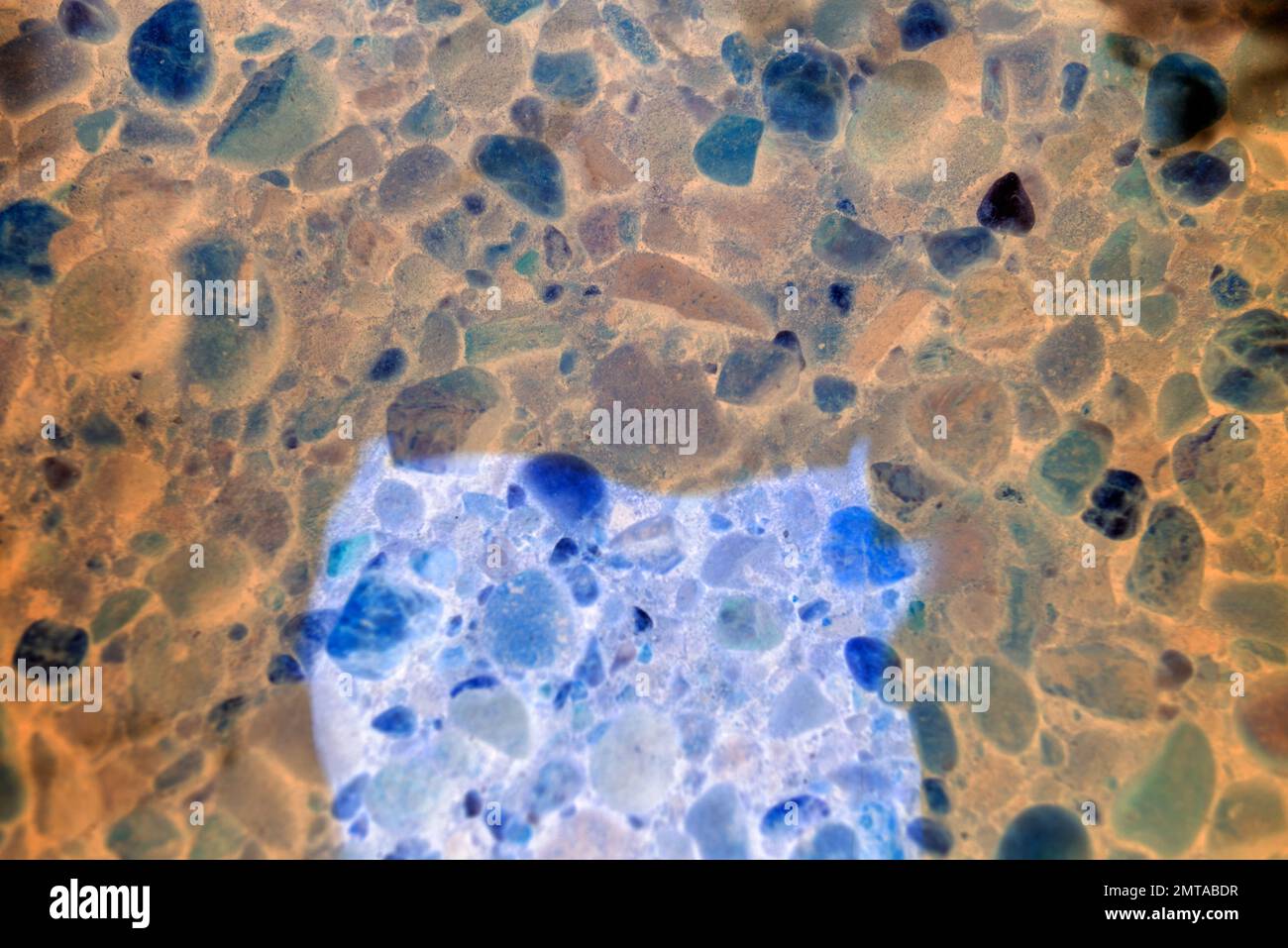 Abstract photo of a transparent water surface with light reflection on ...