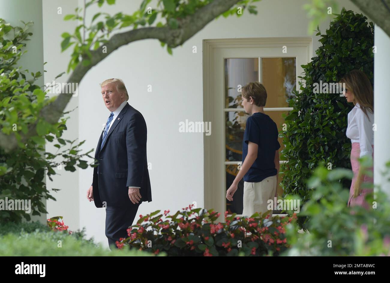 President Donald Trump, first lady Melania Trump and Barron Trump walk ...