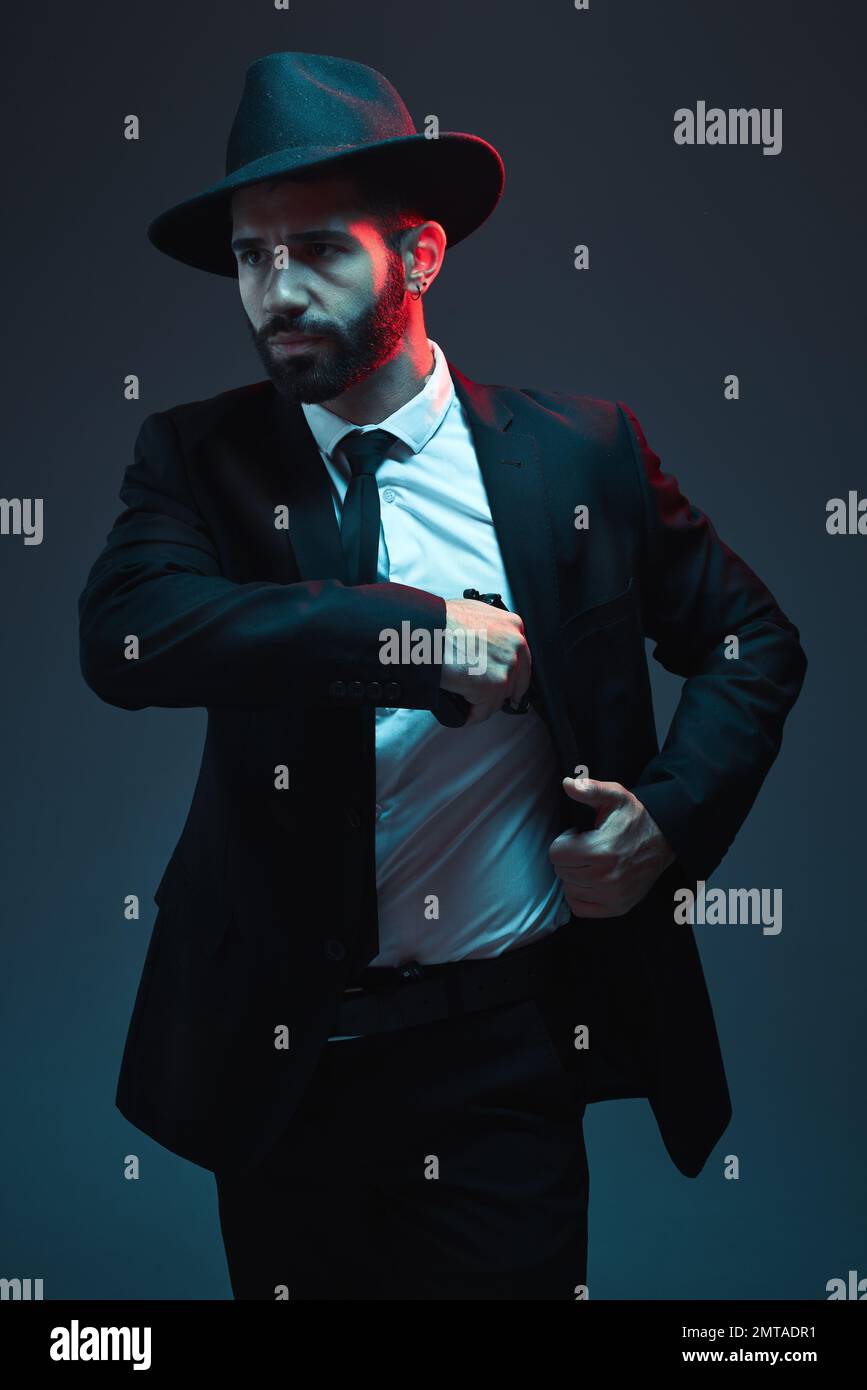 Young gangster in suit hat hi-res stock photography and images - Alamy