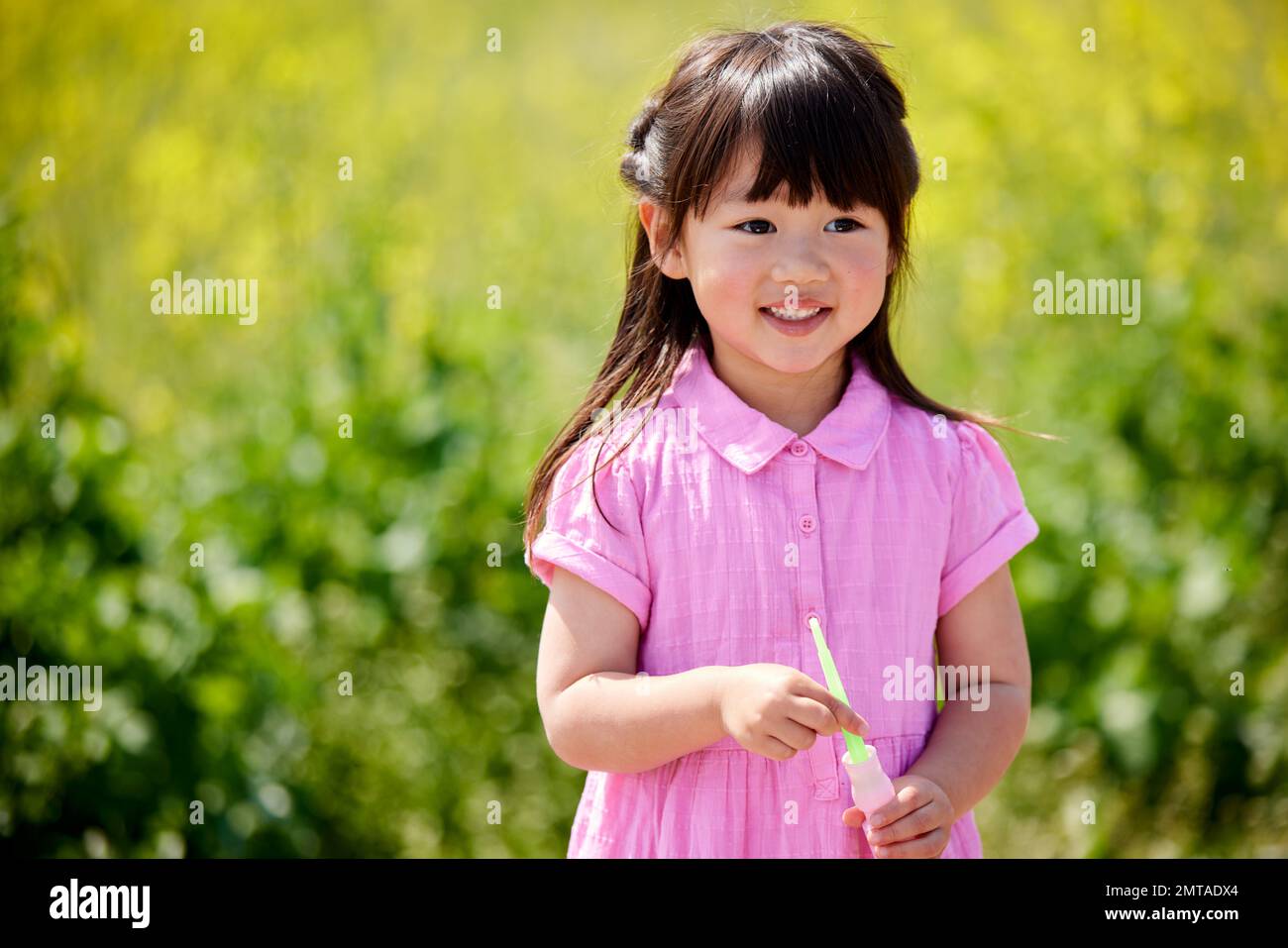 Japanese kid portrait in a city park Stock Photo - Alamy