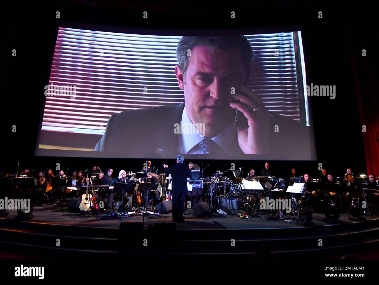 Conductor Mark Watters conducts the score from The Good Fight during ...