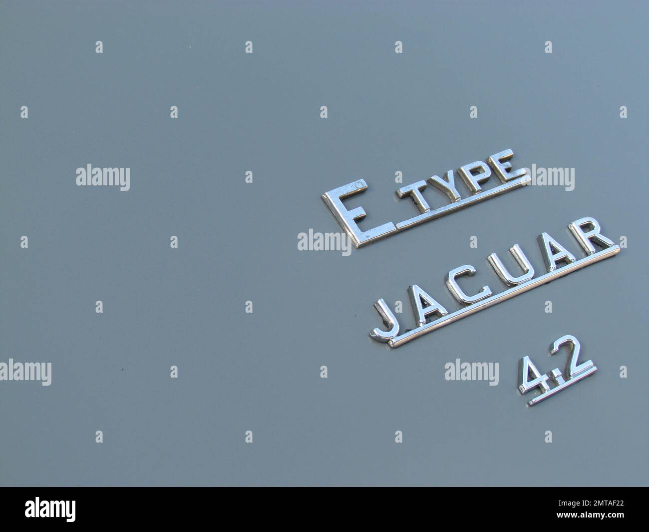 The emblem of an Old Classic English car Jaguar E-Type Stock Photo - Alamy