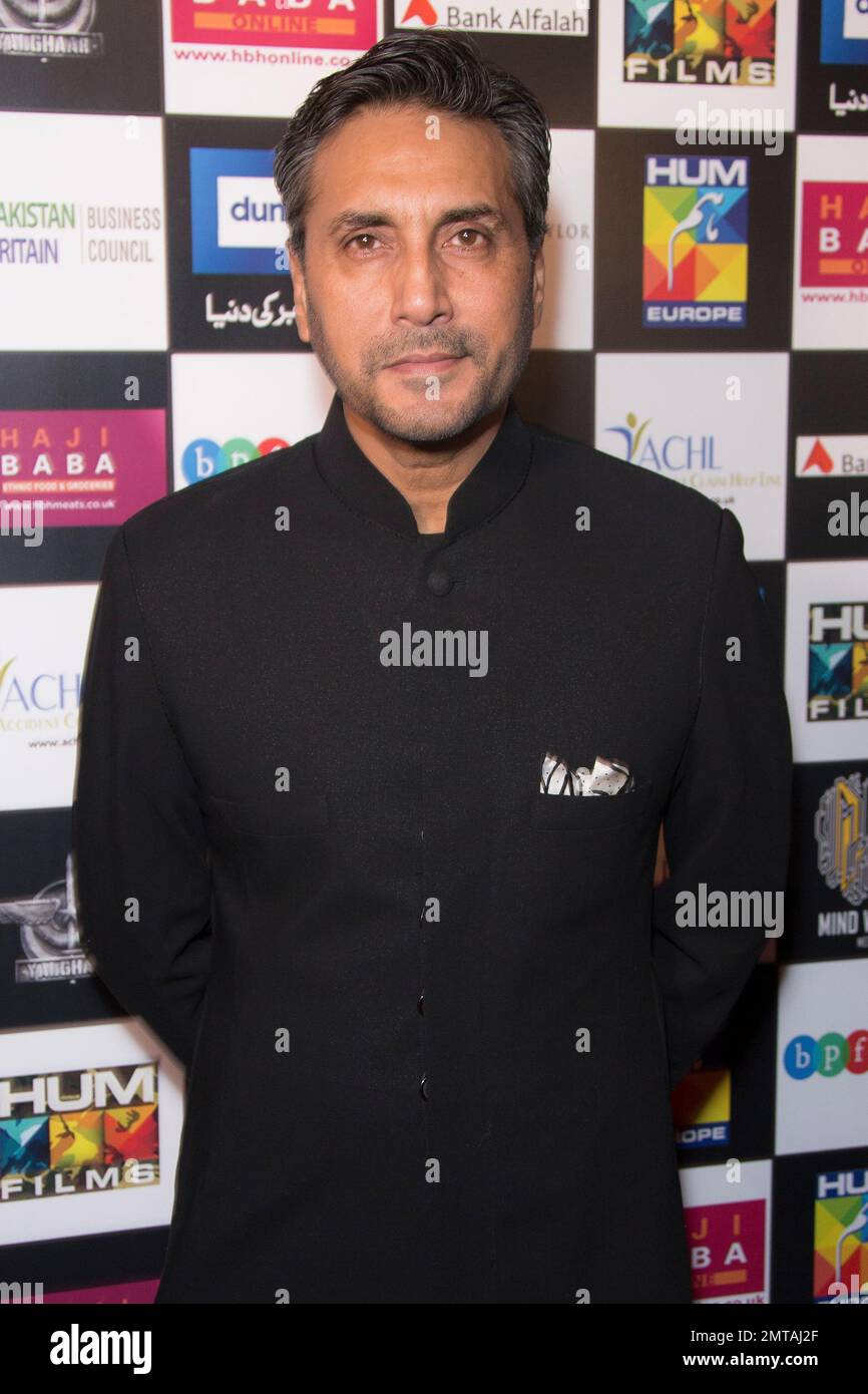 Actor Adnan Siddiqui poses for photographers upon arrival at the ...