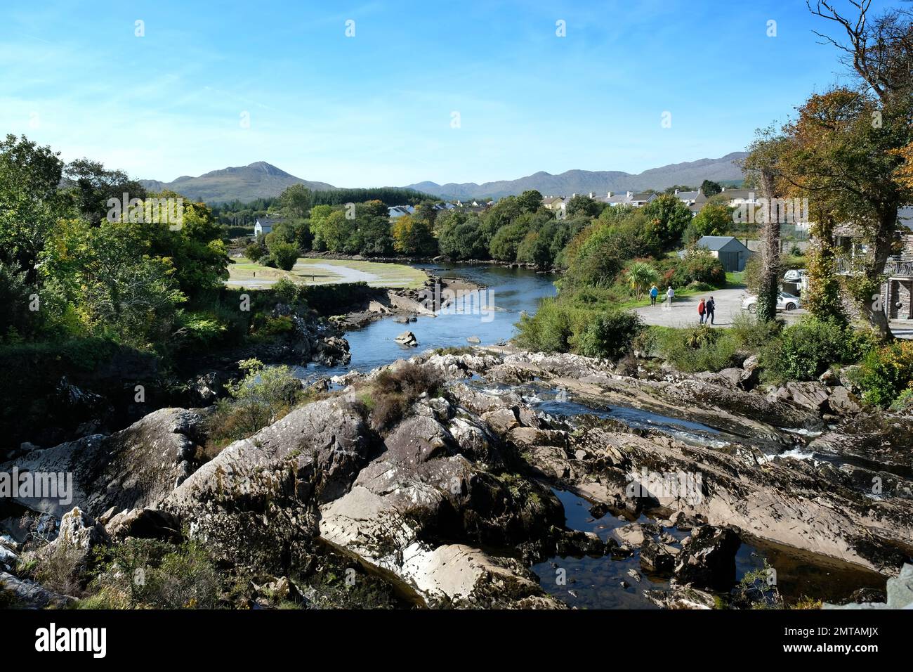 The River Sneem flowing through the centre of Sneem on the Ring of ...