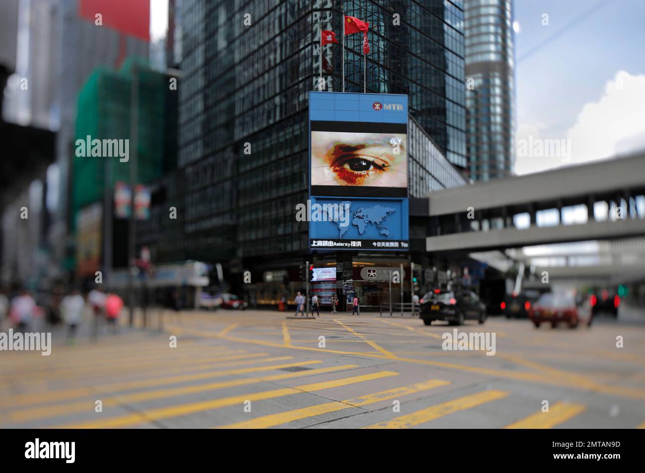 In this June 23, 2017, photo made with a tilt-shift lens, a Chinese ...