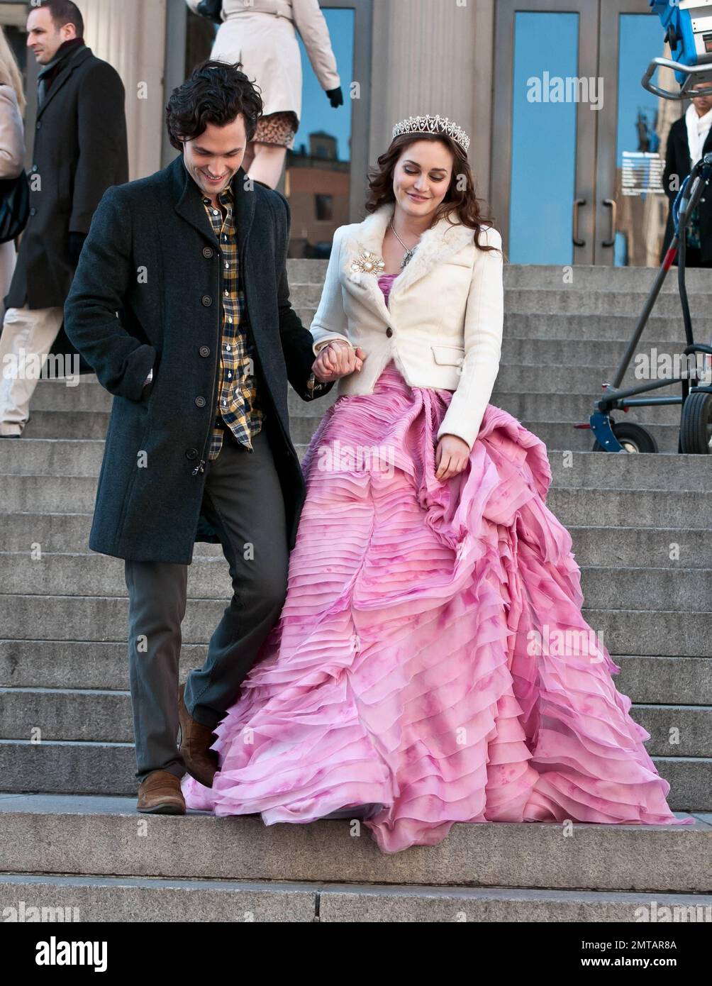 Penn Badgley and Leighton Meester are seen on set filming a scene for ...