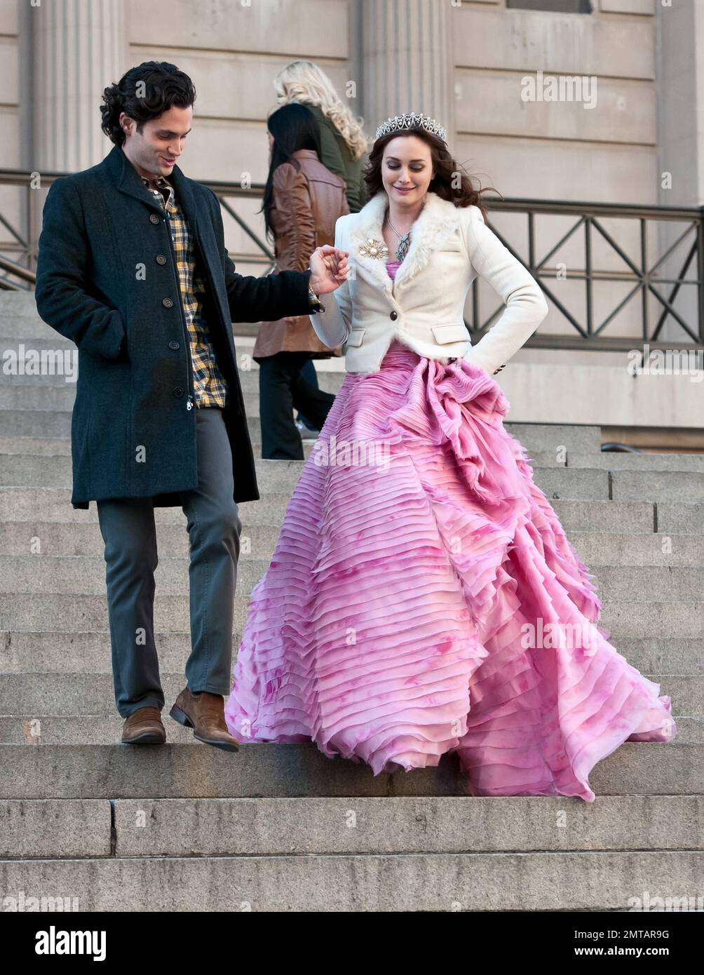 Penn Badgley and Leighton Meester are seen on set filming a scene for ...