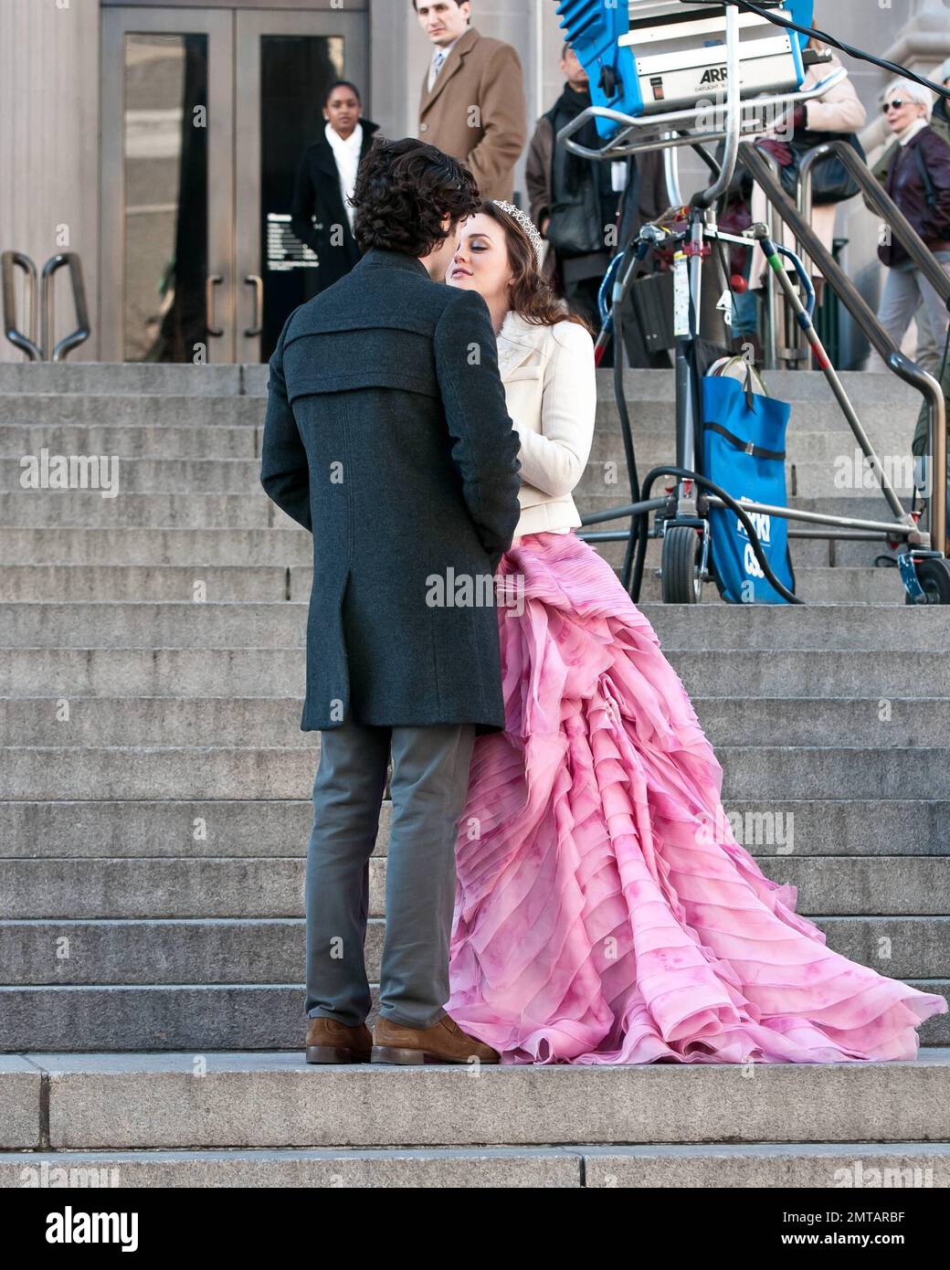 Penn Badgley and Leighton Meester are seen on set filming a scene for ...