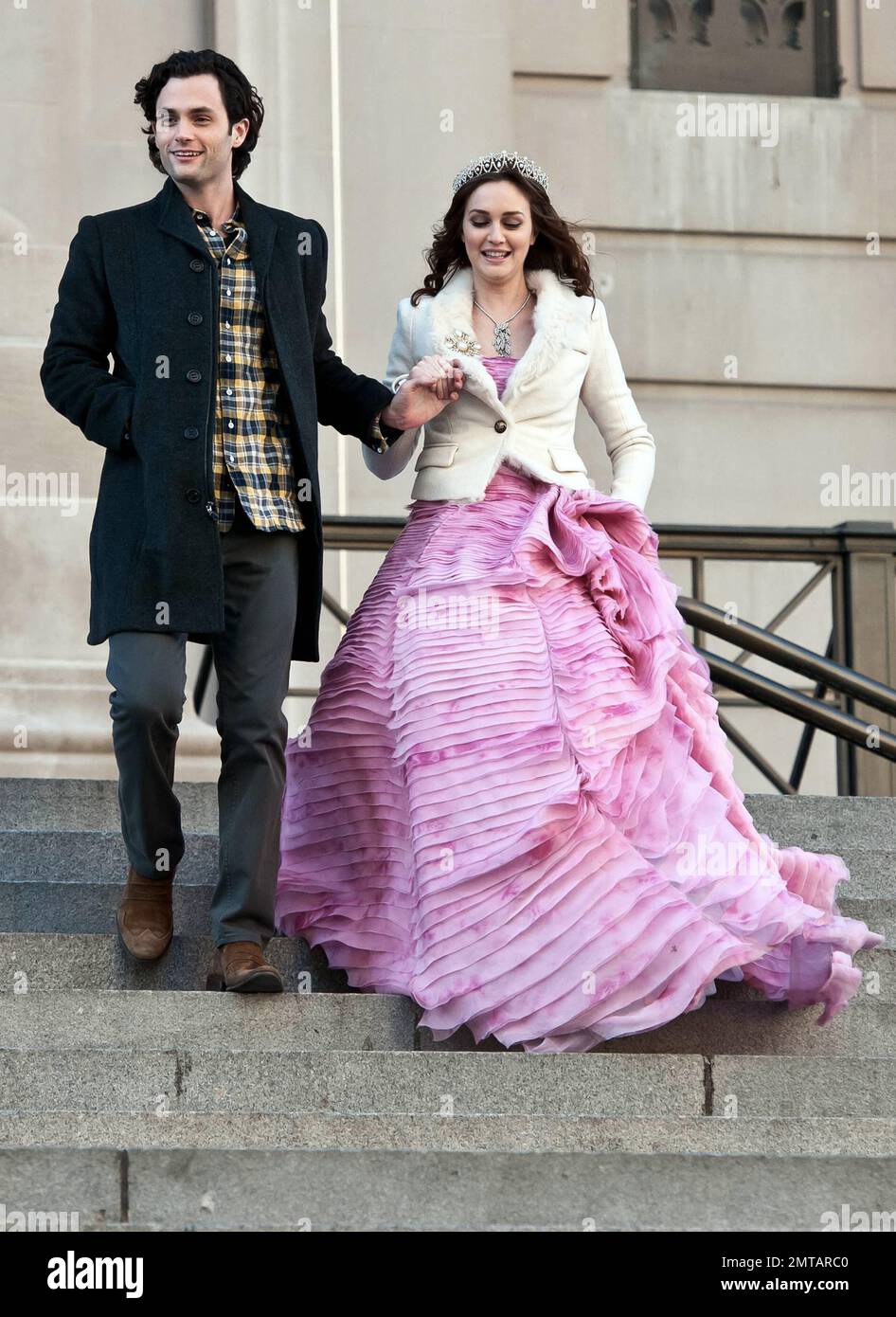 Penn Badgley and Leighton Meester are seen on set filming a scene for ...