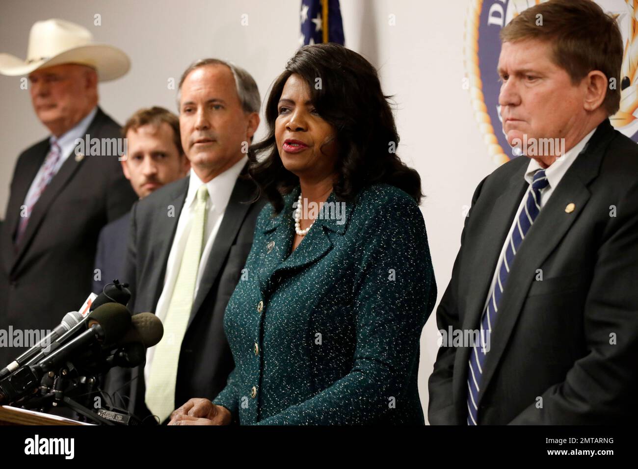 Dallas County District Attorney Faith Johnson, second from right, makes ...