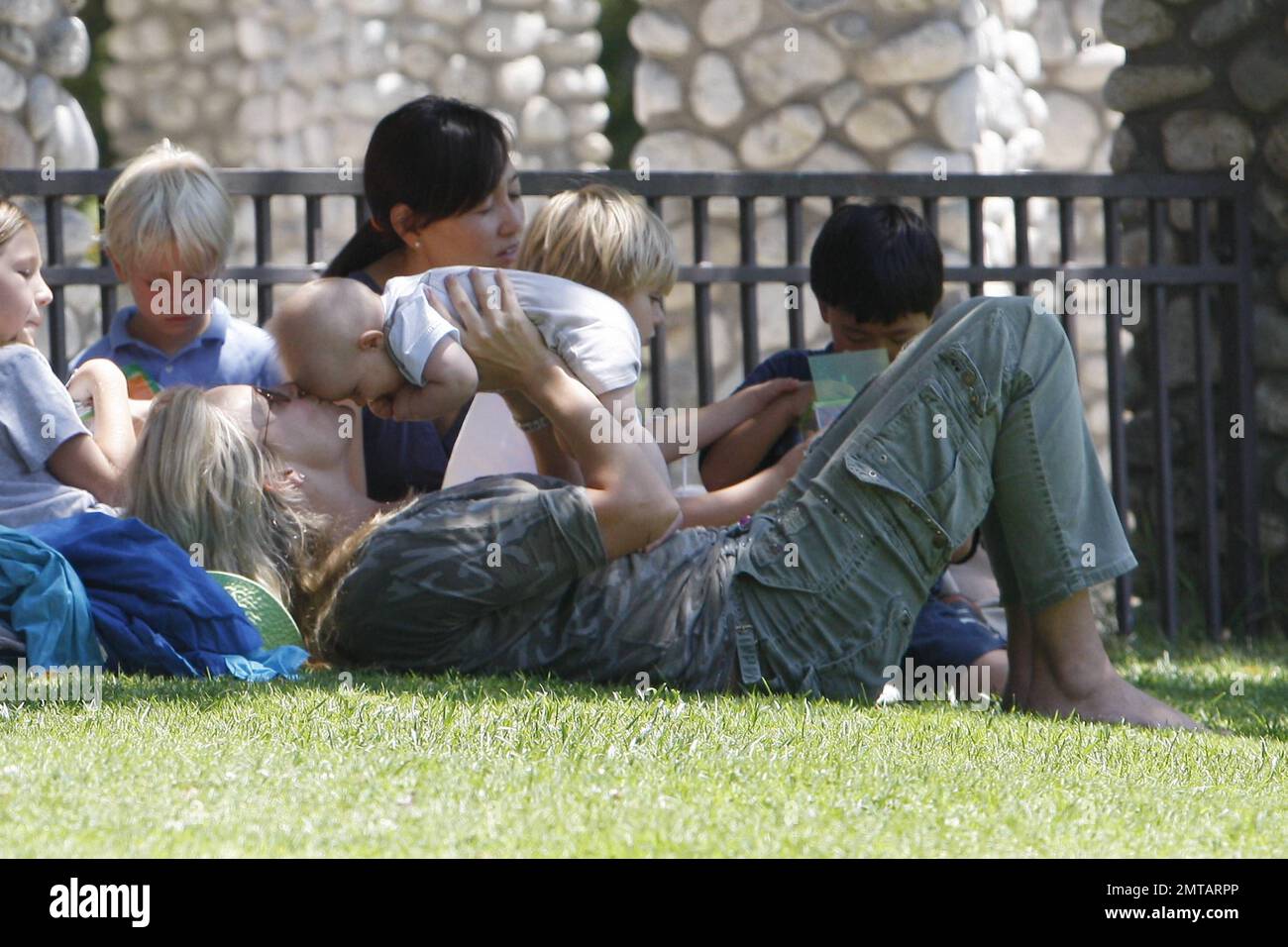Penny Lancaster plays with new-born son Aiden in a Los Angeles park, LA ...