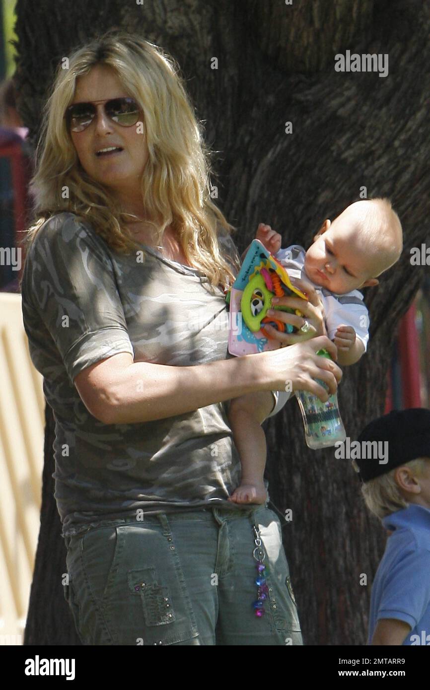Penny Lancaster plays with new-born son Aiden in a Los Angeles park, LA ...
