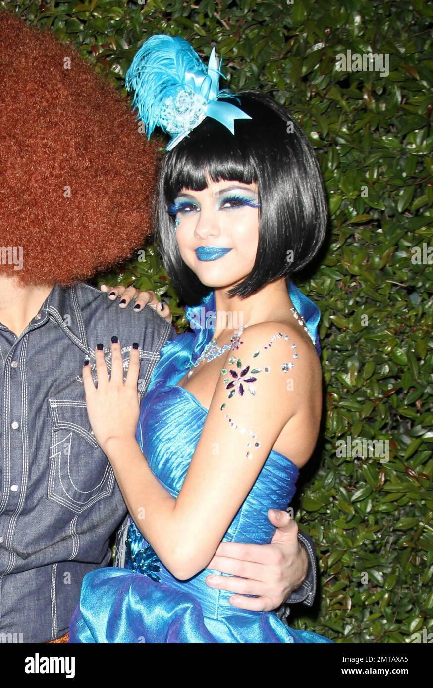 Selena Gomez Dressed In A Shimmering Blue Dress With Blue Sparkle