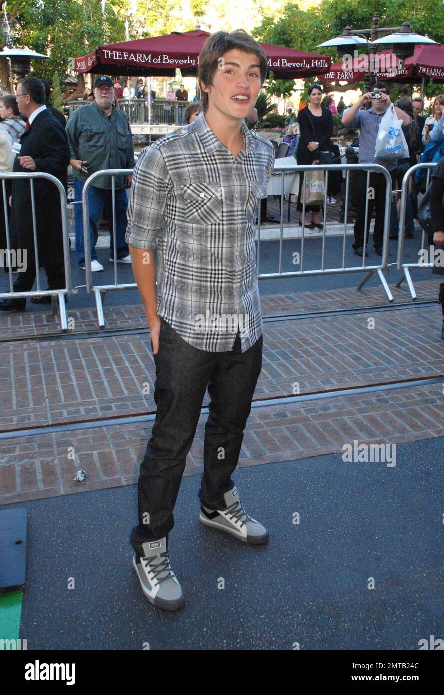 Gregg Sulkin walks the carpet at the premiere of the family film "The ...