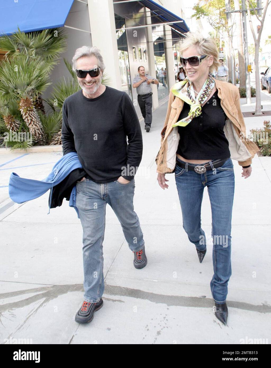 A perky Sharon Stone and her new beau shop and stroll in Beverly Hills ...