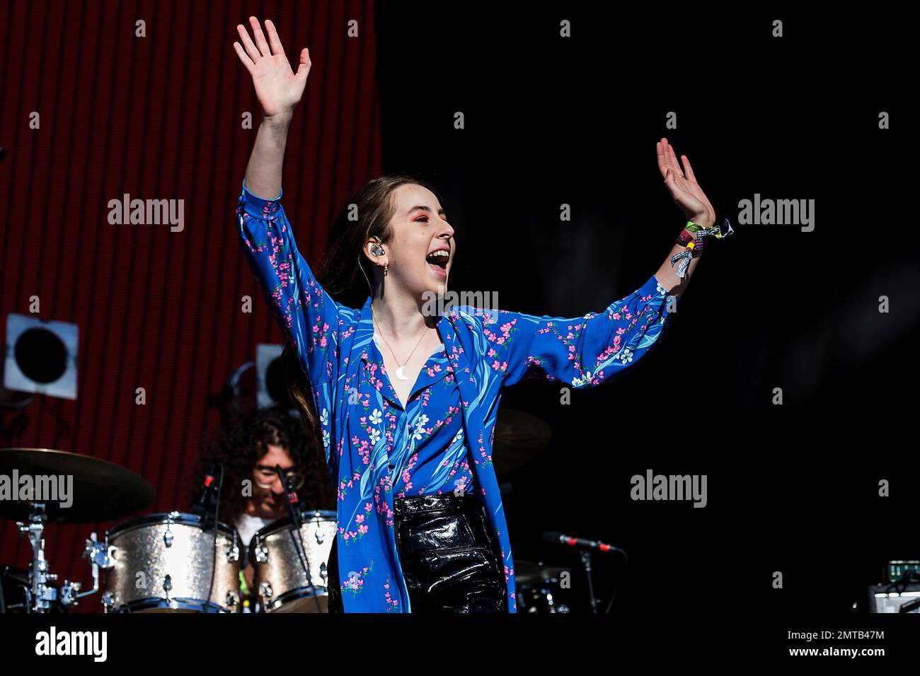 Musician Alana Haim greets festival goers at the Glastonbury Festival ...