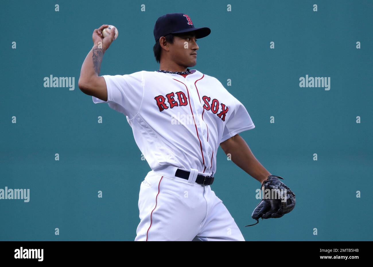 Boston Red Sox shortstop Tzu-Wei Lin warms up before a baseball game at ...
