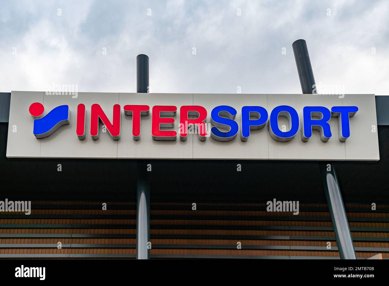 The logo of Intersport store on the building facade Stock Photo - Alamy
