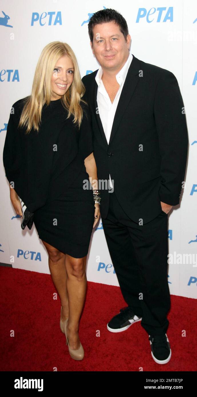 Dan Neri (R) walks the red carpet at PETA's 30th Anniversary Gala ...