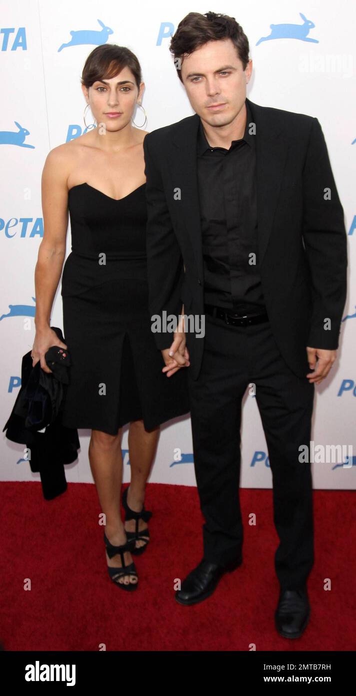 Actor and director Casey Affleck and wife actress Summer Phoenix walk ...