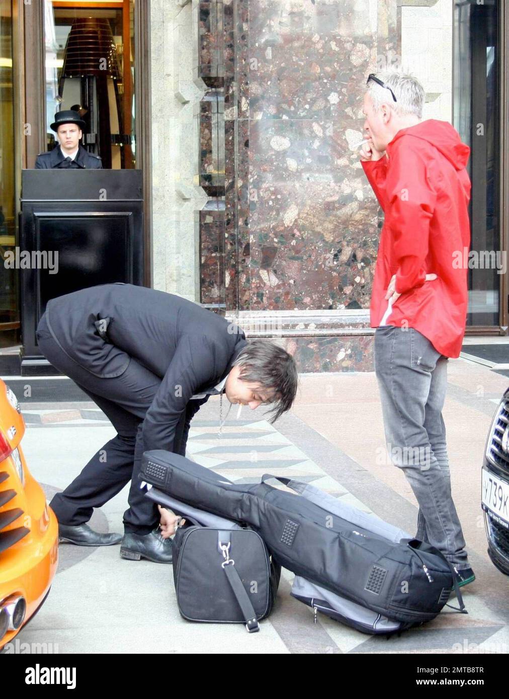 - RUSSIA OUT. Pete Doherty signs autographs for fans outside his hotel ...