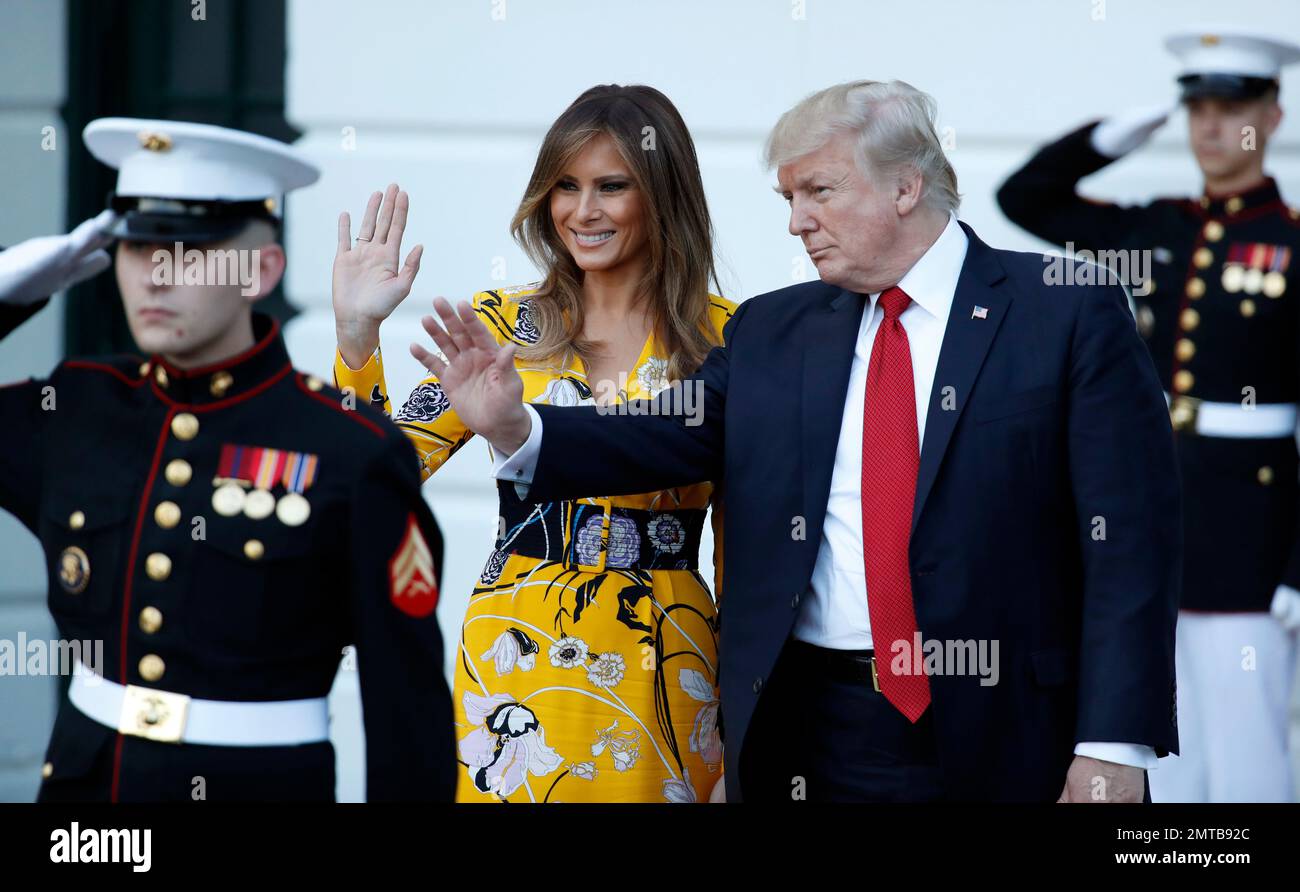 President Donald Trump and first lady Melania Trump wave as Indian ...