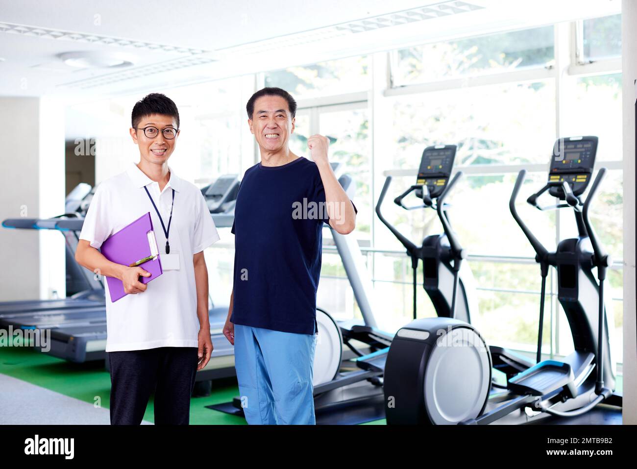 Japanese senior man training at indoor gym Stock Photo - Alamy