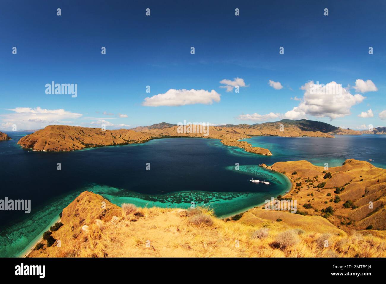 Green and blue waters of the Flores Sea from the top of Lawa Darat Gili ...