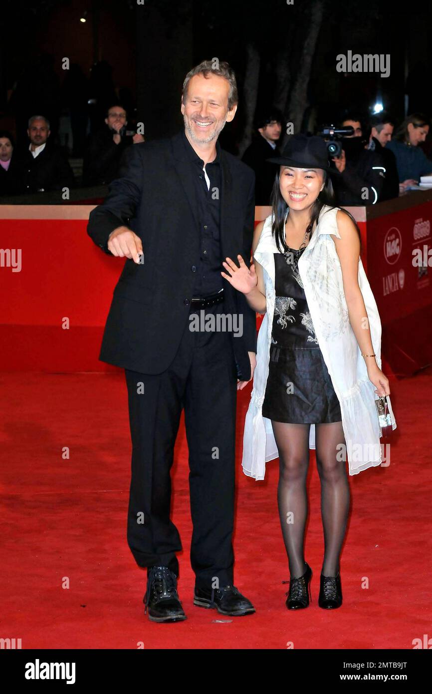 Director and writer Alexandre Rockwell and Jennifer Li pose on the red ...
