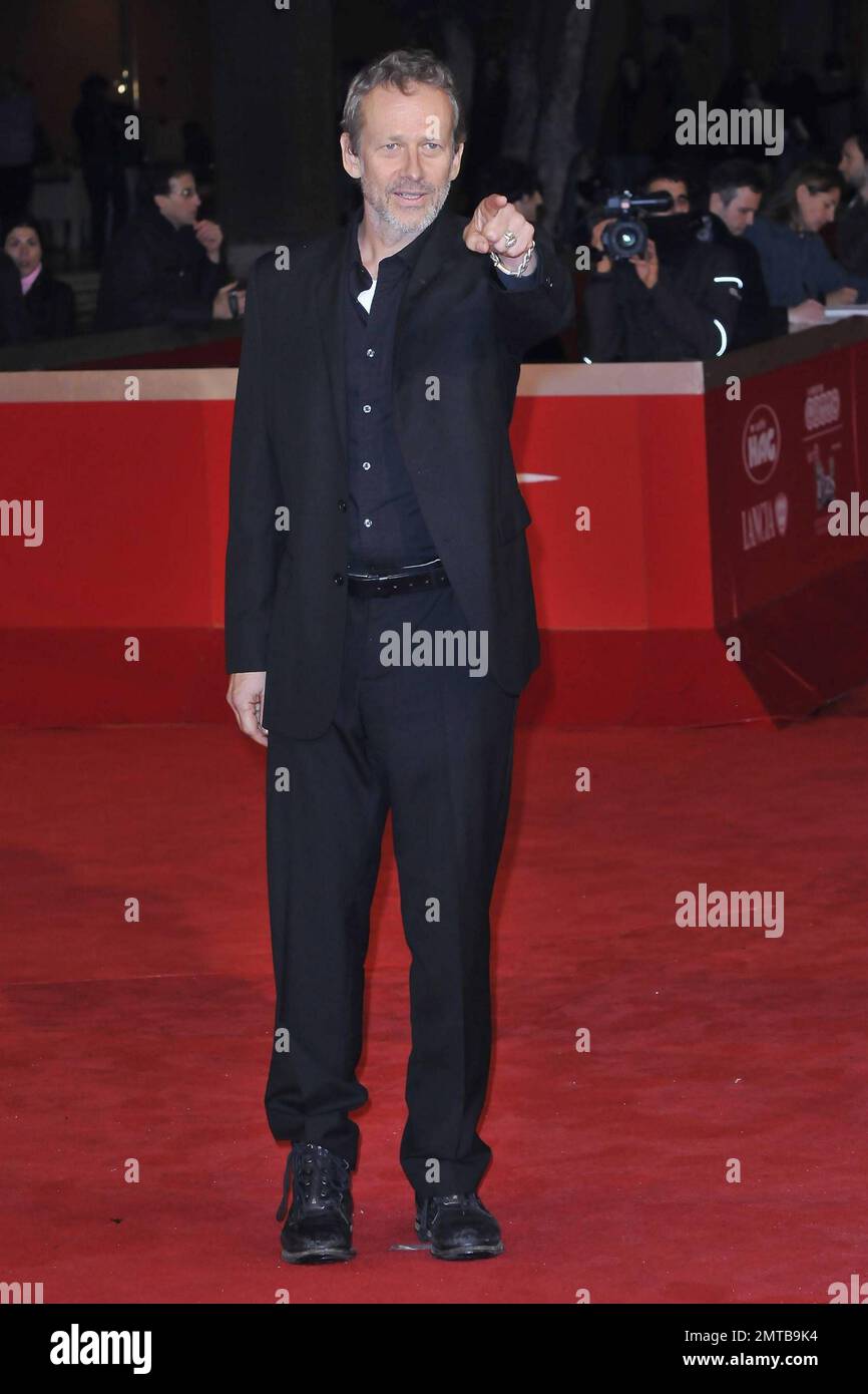 Director and writer Alexandre Rockwell poses on the red carpet at the ...