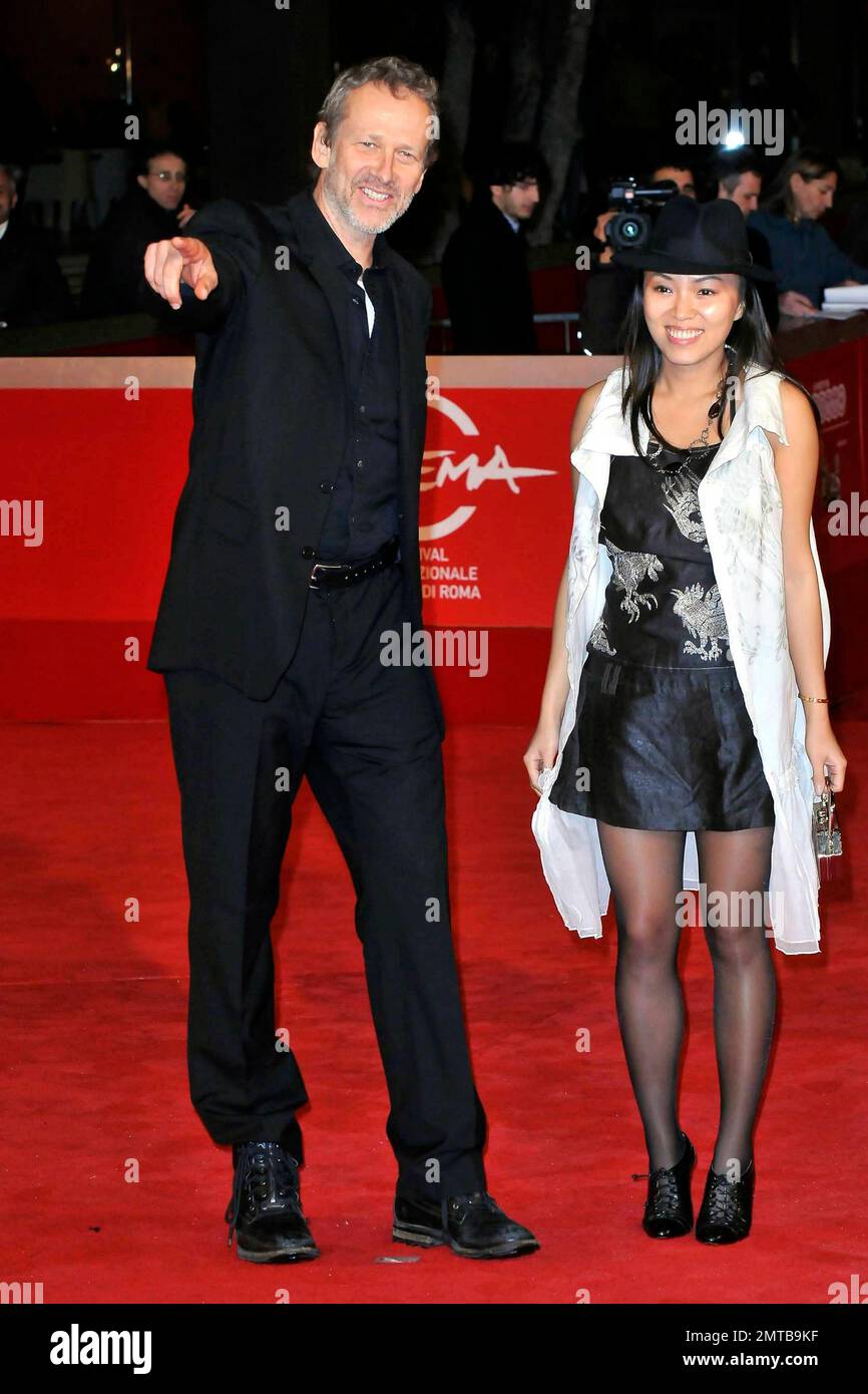 Director and writer Alexandre Rockwell and Jennifer Li pose on the red ...