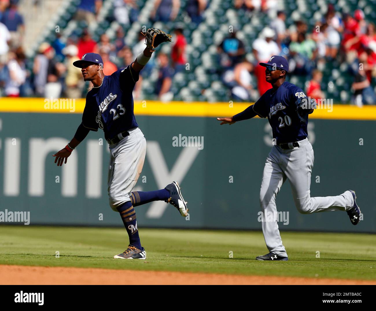 Milwaukee Brewers center fielder Keon Broxton (23) and Lewis Brinson ...