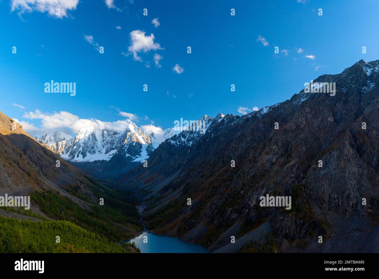 Mountain peaks of altai with glaciers against the sky hi-res stock ...