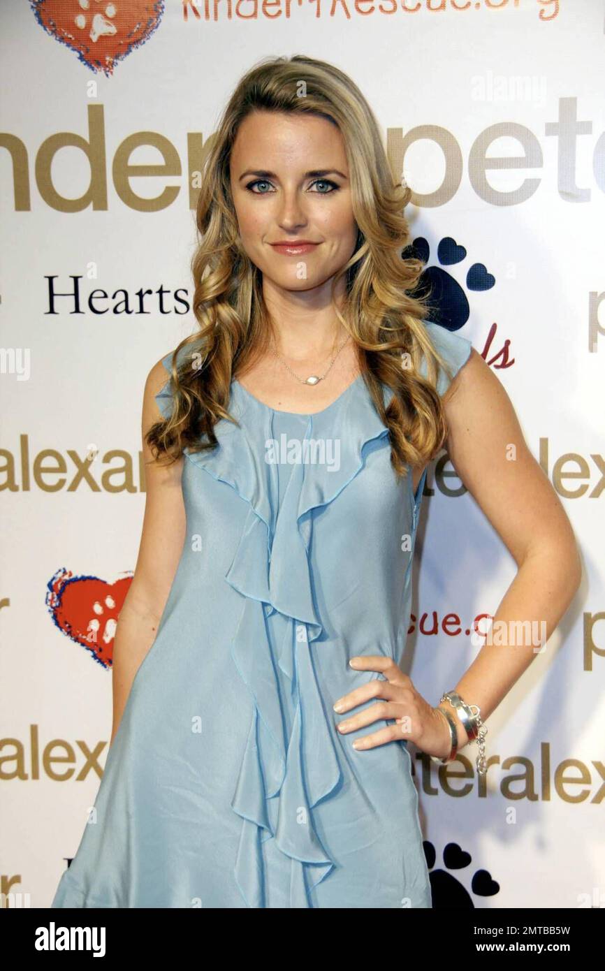 Trilby Glover attends the puppy-themed grand opening of the new Peter ...