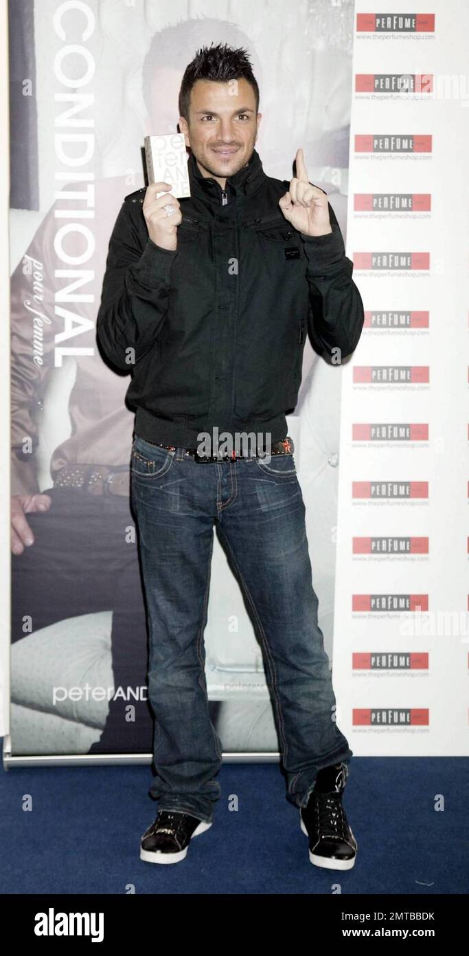 Peter Andre poses with his fragrance Unconditional at a signing at the ...