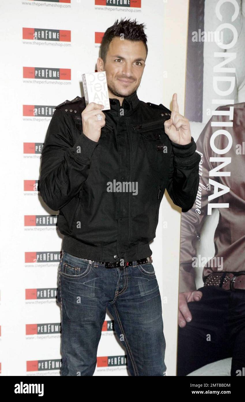 Peter Andre poses with his fragrance Unconditional at a signing at the ...