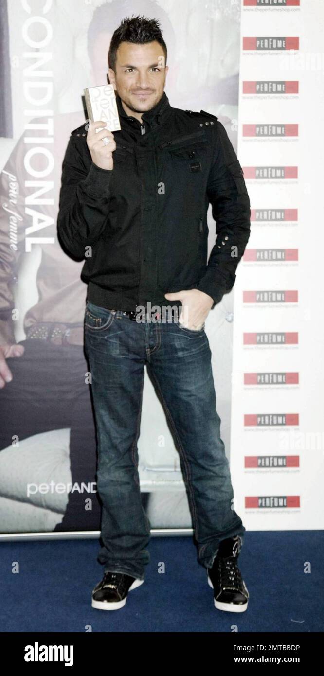 Peter Andre poses with his fragrance Unconditional at a signing at the ...
